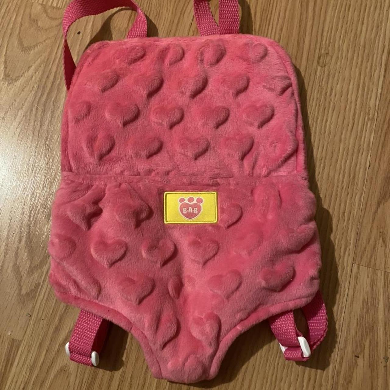 Pink Build-A-Bear backpack with heart pattern. Like... - Depop