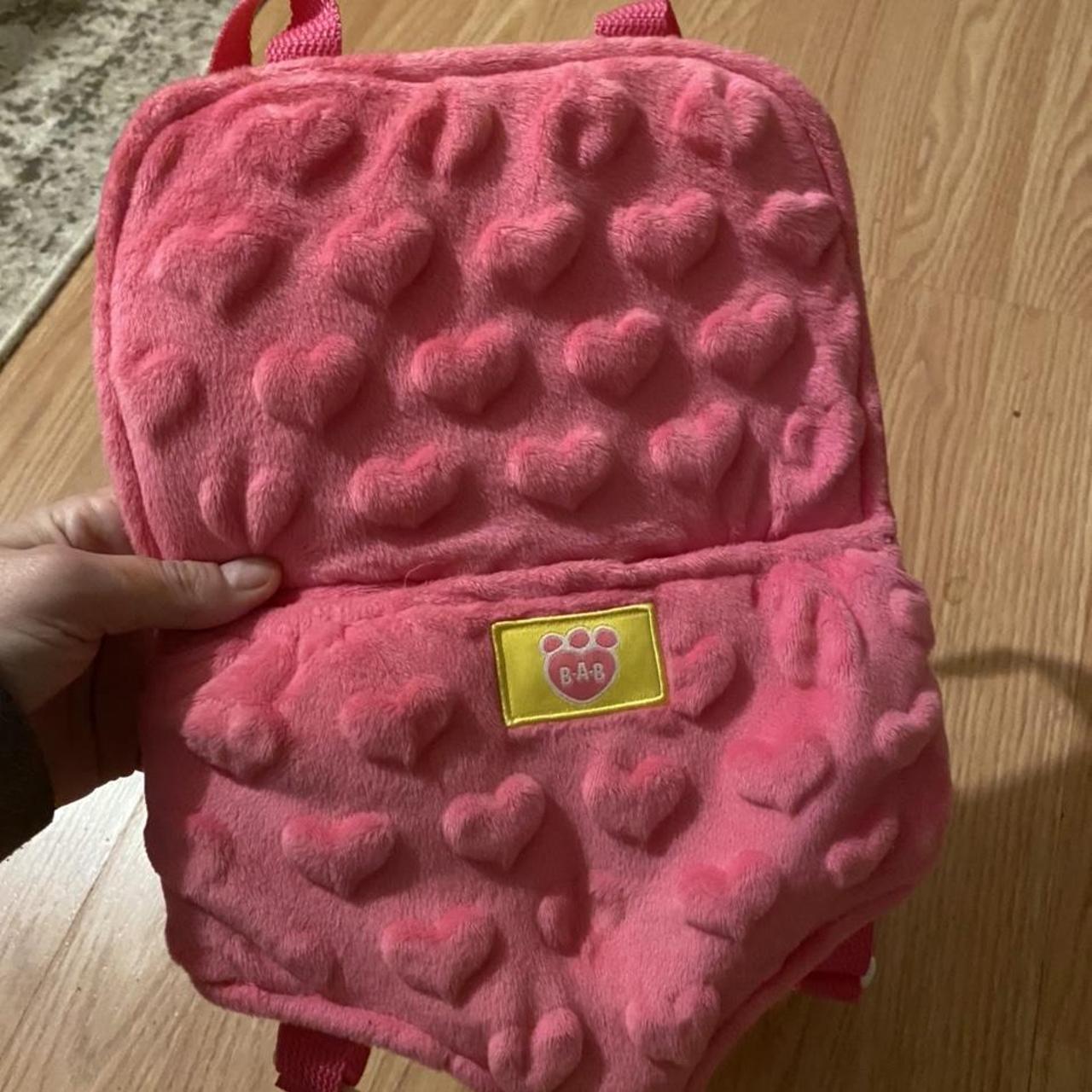 Pink Build-A-Bear backpack with heart pattern. Like... - Depop