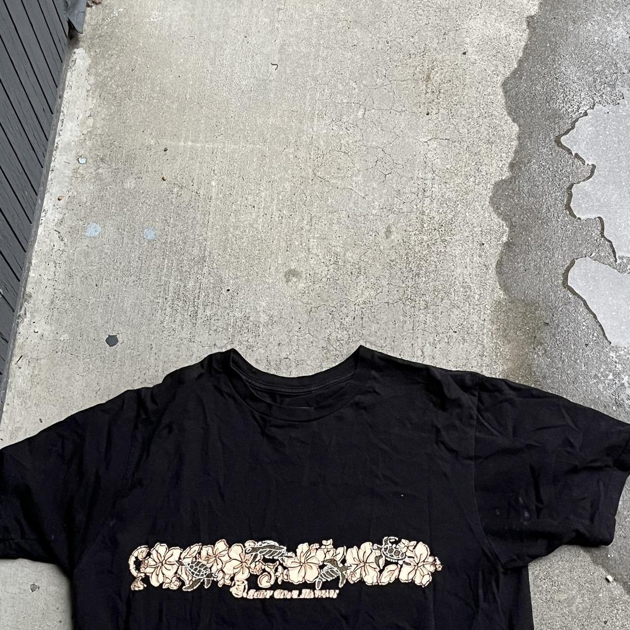 Black Hawaii Graphic Tee. One small flaw and cracked... - Depop