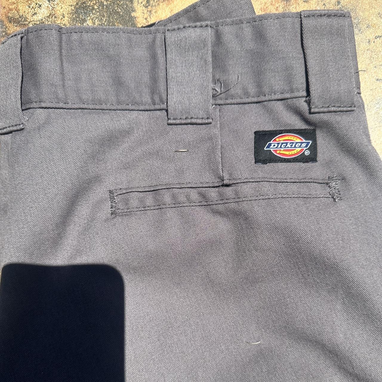 Grey Dickies Pants. Only flaw is the little white... - Depop