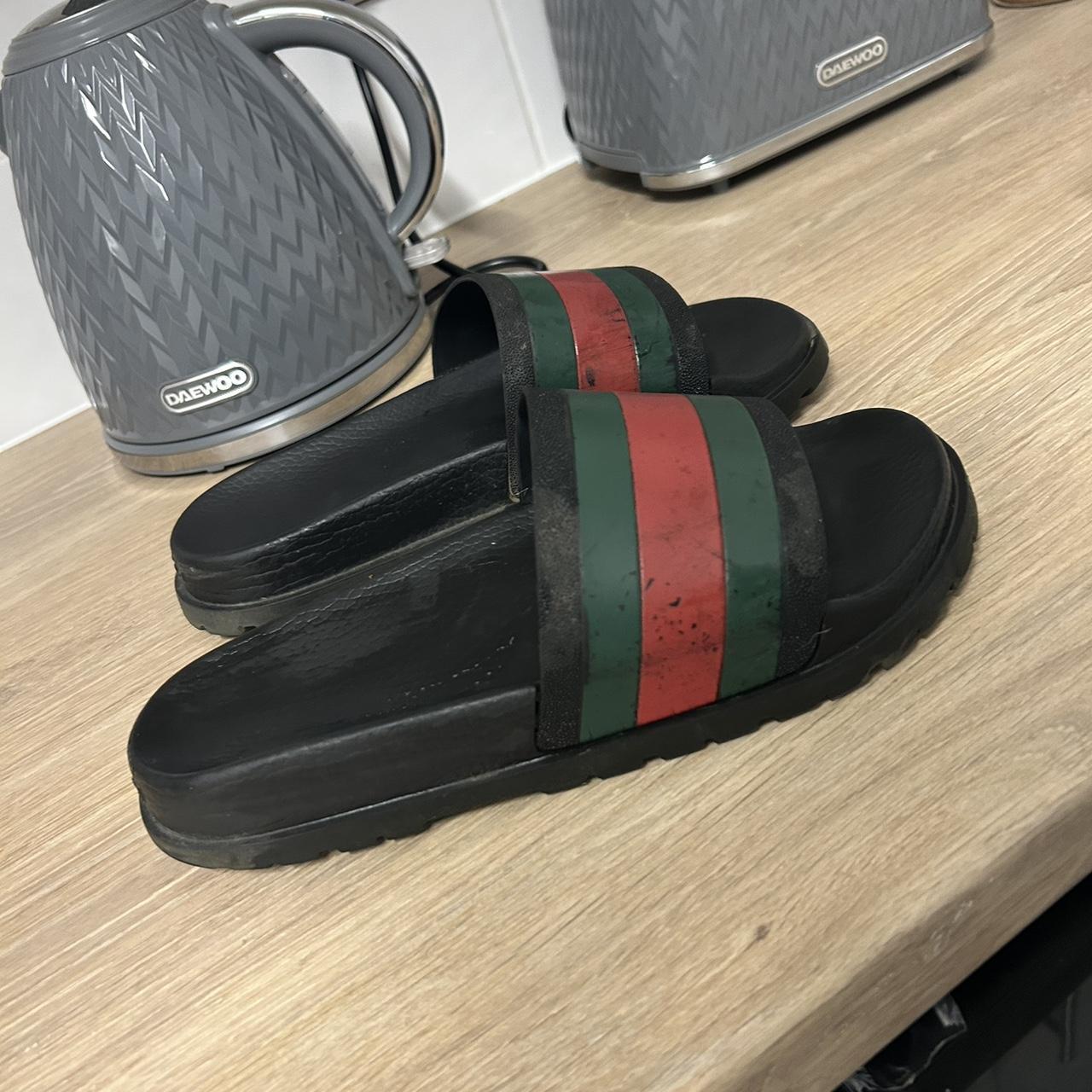 Men’s genuine Gucci sliders Few scuffs on the... - Depop