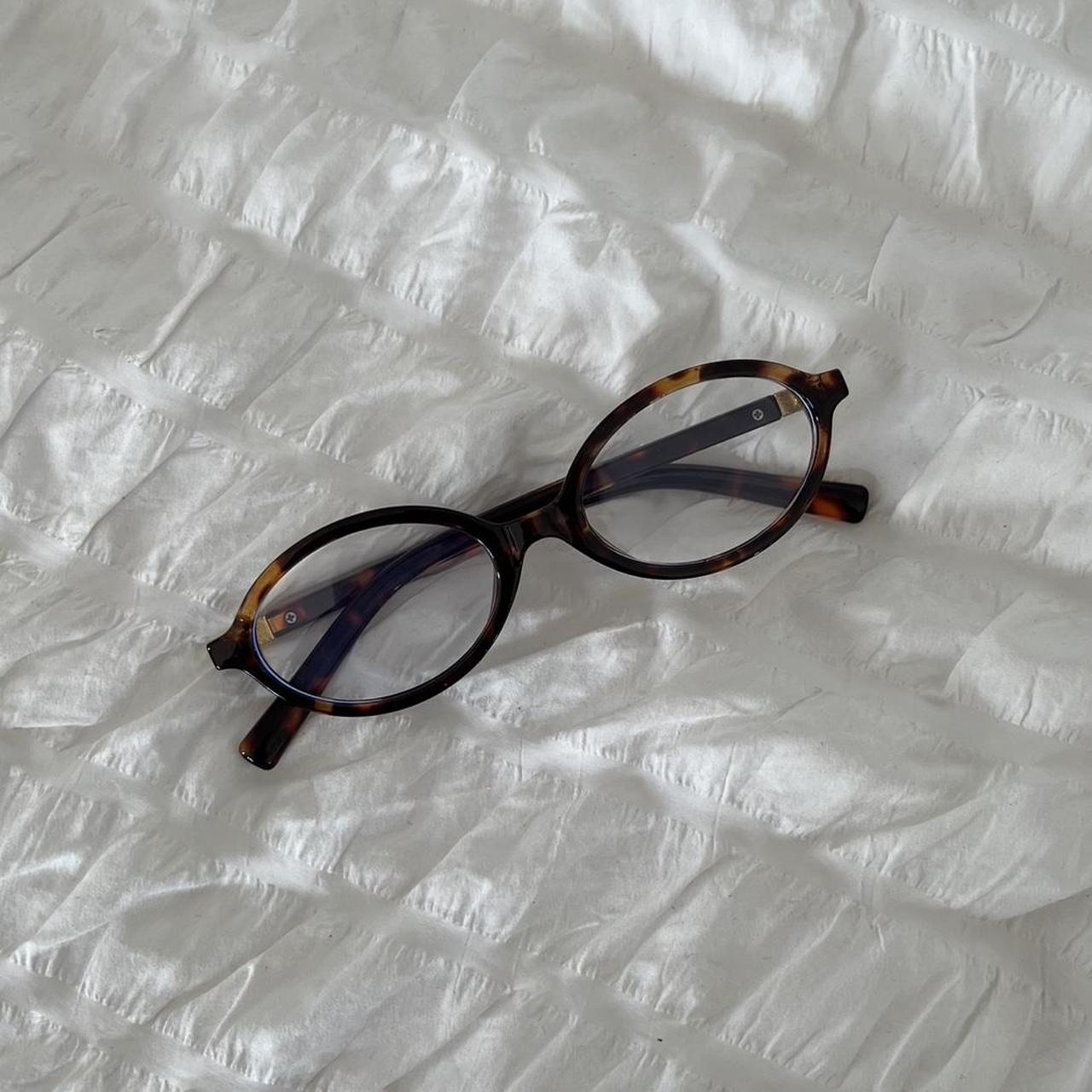 oval tortoise shell framed glasses similar to the... - Depop