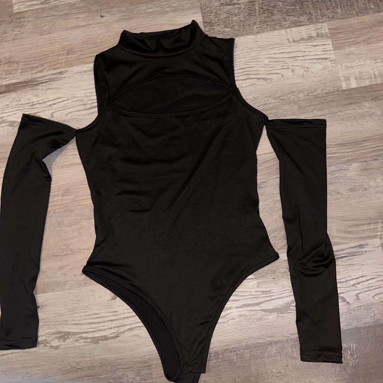 black cut out body suit -never worn -size medium... - Depop