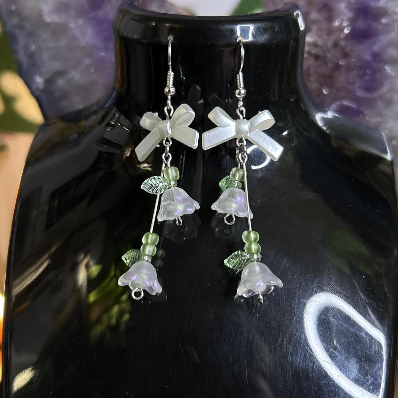 Small White Iridescent Croquette Bell Flower Drop... | Depop