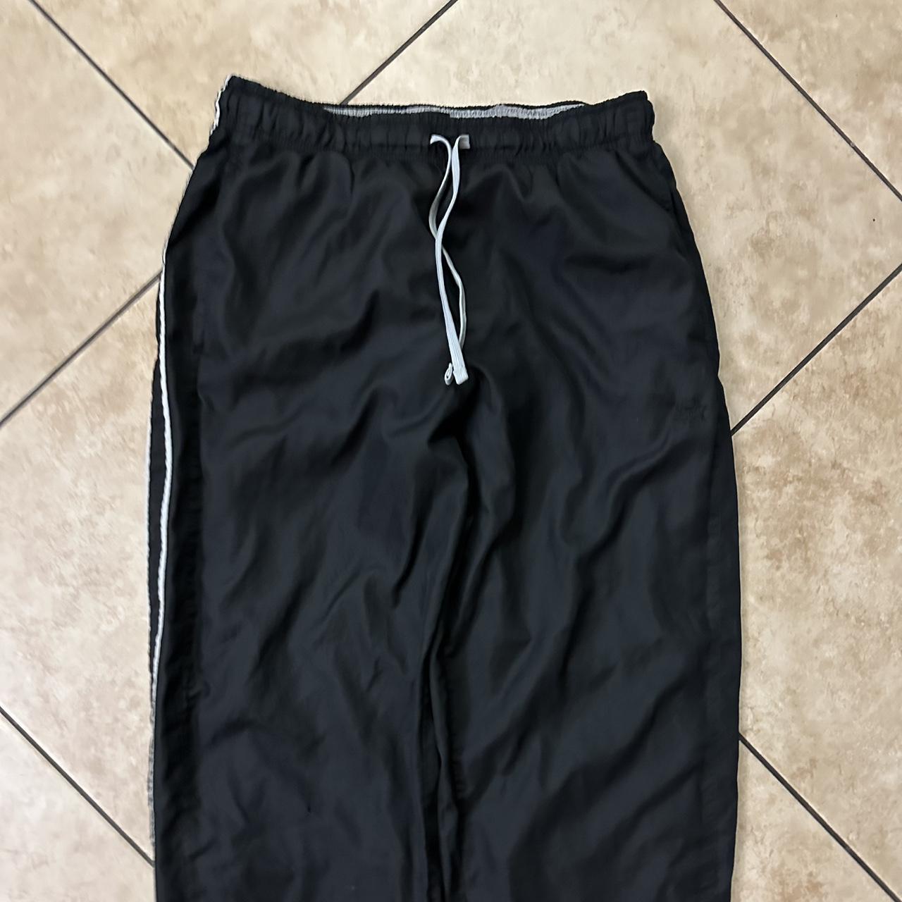 Black and white Starter sweatpants with adjustable... | Depop