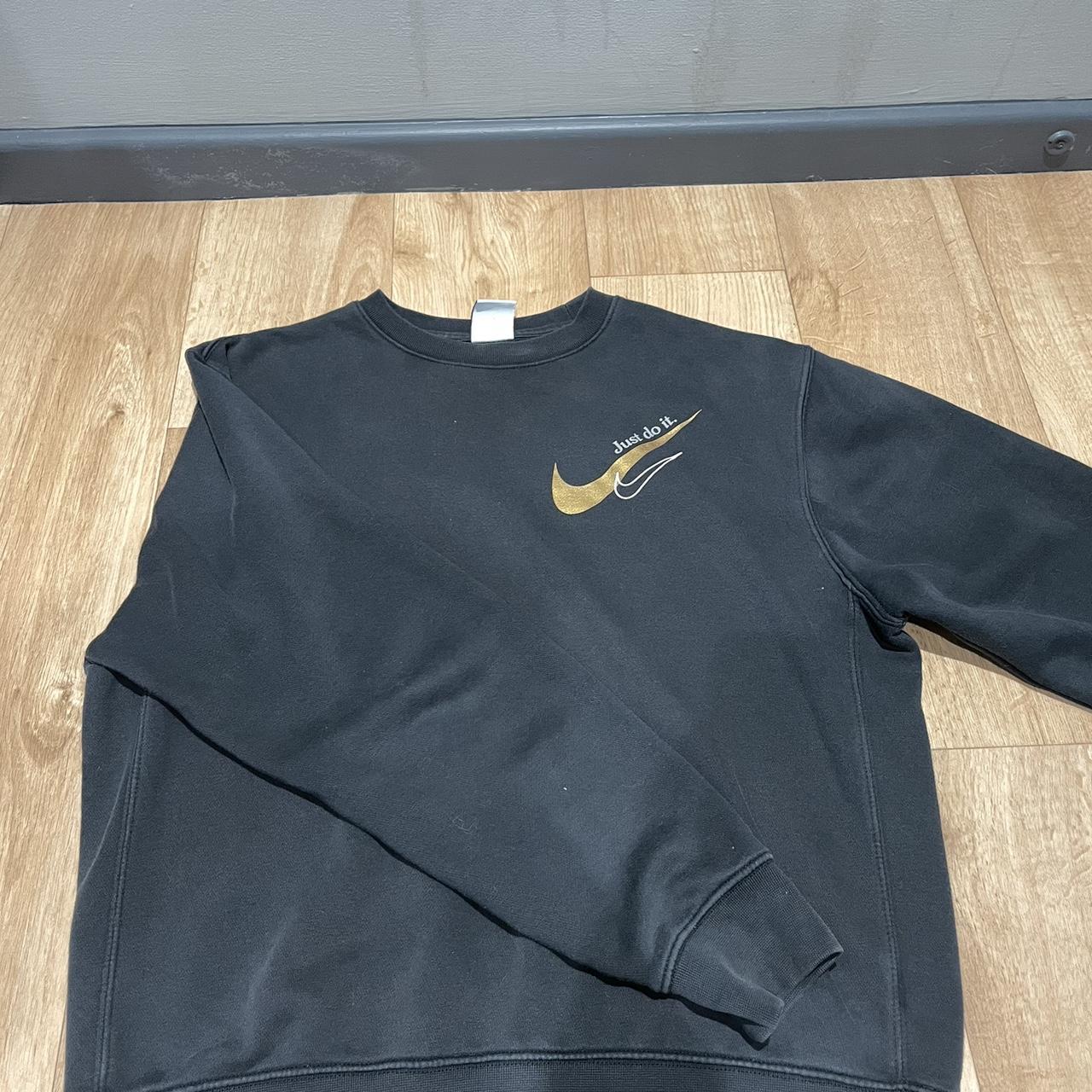⚠️ black Nike gold swoosh jumper ⚠️ - Slight fading... - Depop