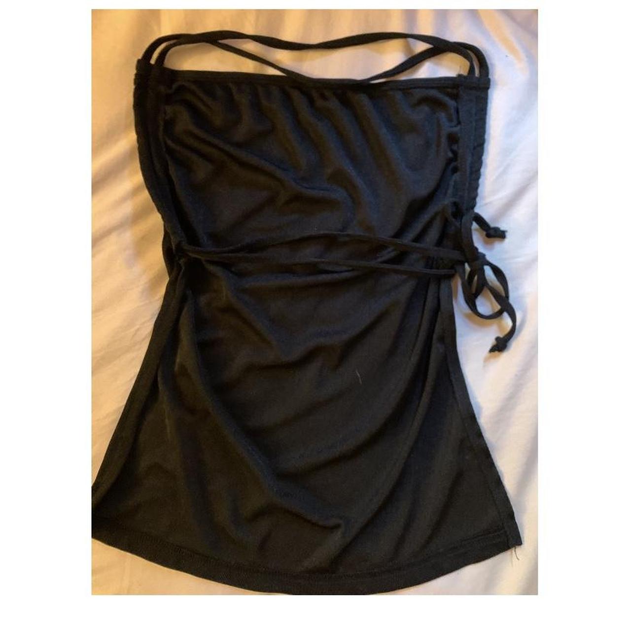 basic black top a little sheer and ties in the back... - Depop