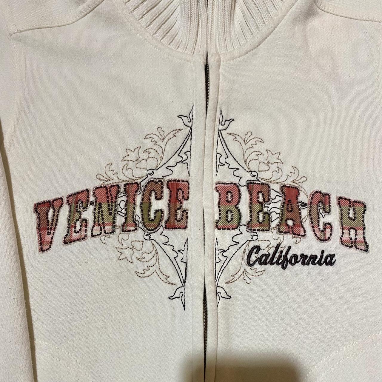 vintage venice beach zip up jumper with high neck in... - Depop