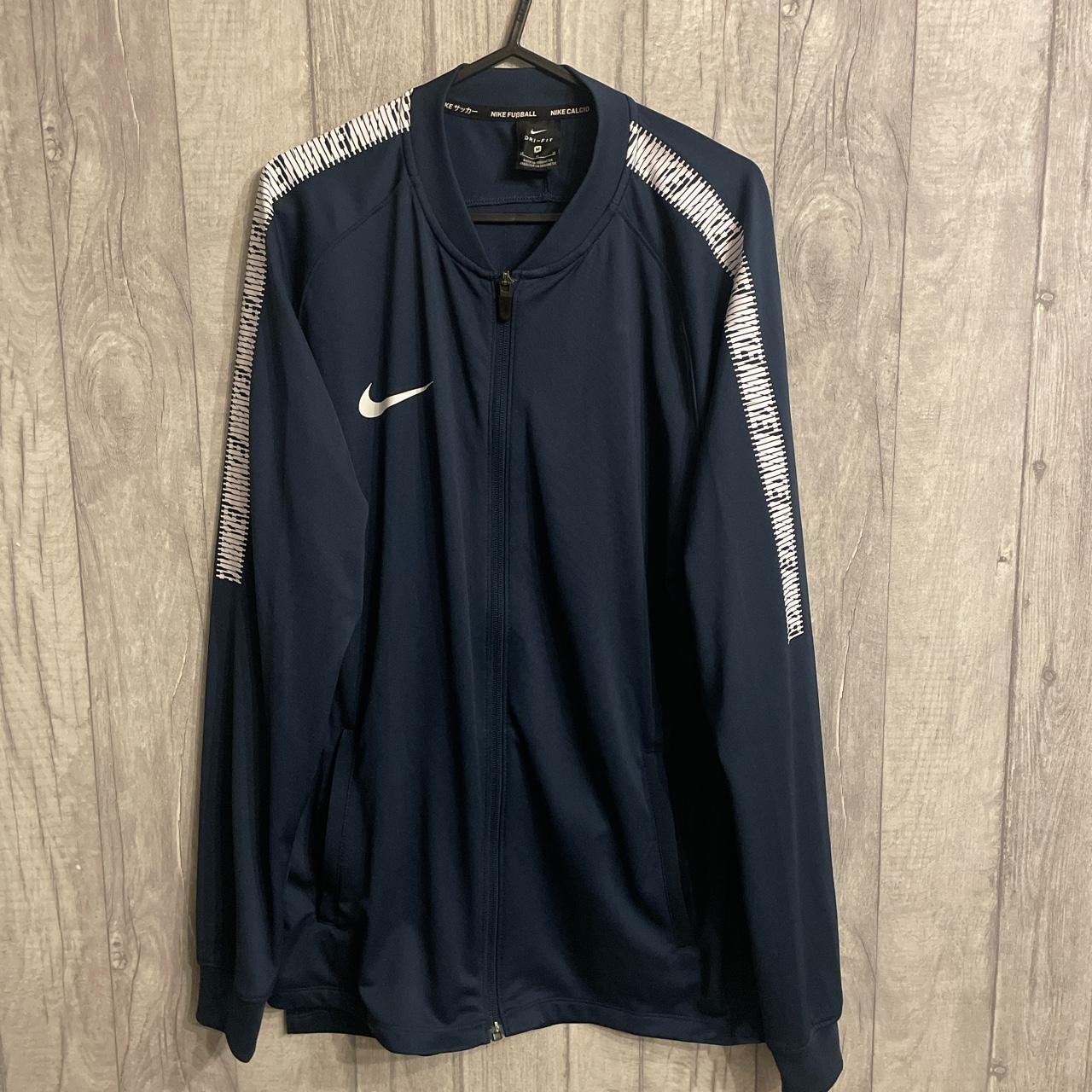 Navy Nike football jacket in medium Condition -... - Depop