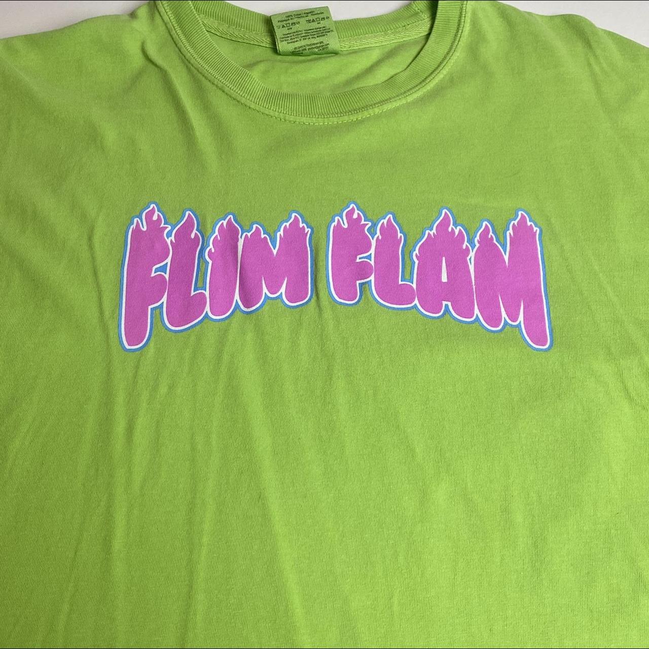 Official Flamingo Merchandise Pink Flaming Text on... | Depop