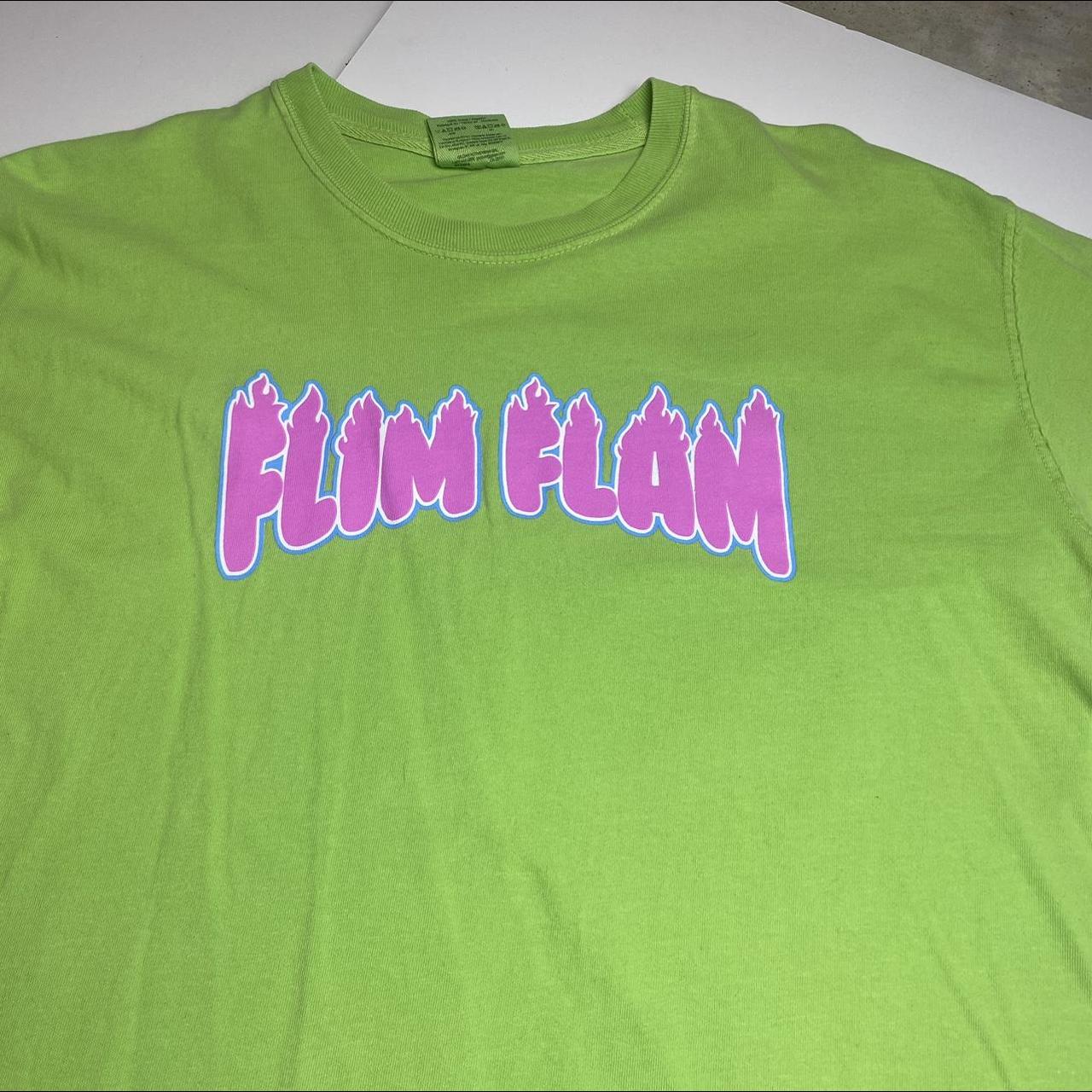 Official Flamingo Merchandise Pink Flaming Text on... | Depop