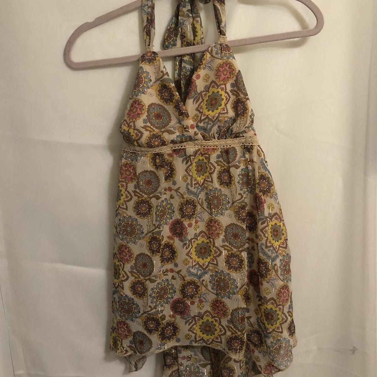 Super cute flowy halter top I cute out the pads... - Depop