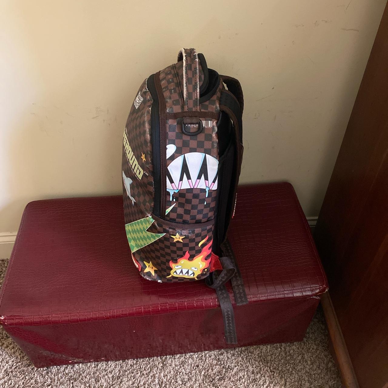 This is a leather spray-ground book bag, good for... - Depop