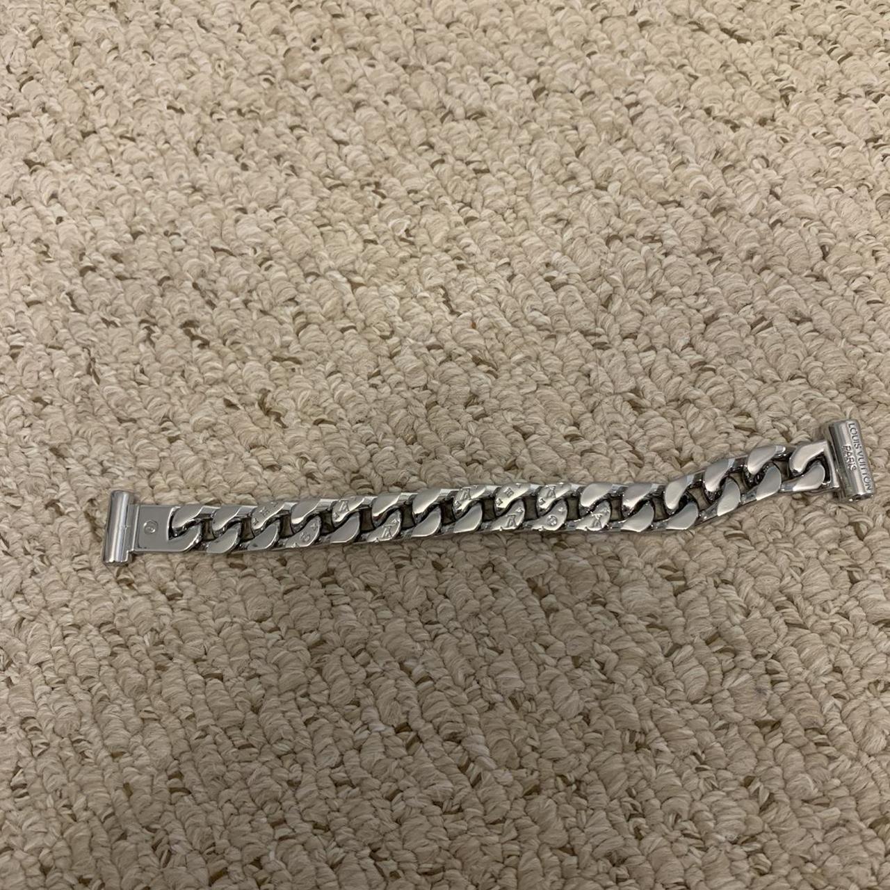 Louis Vuitton bracket - Depop