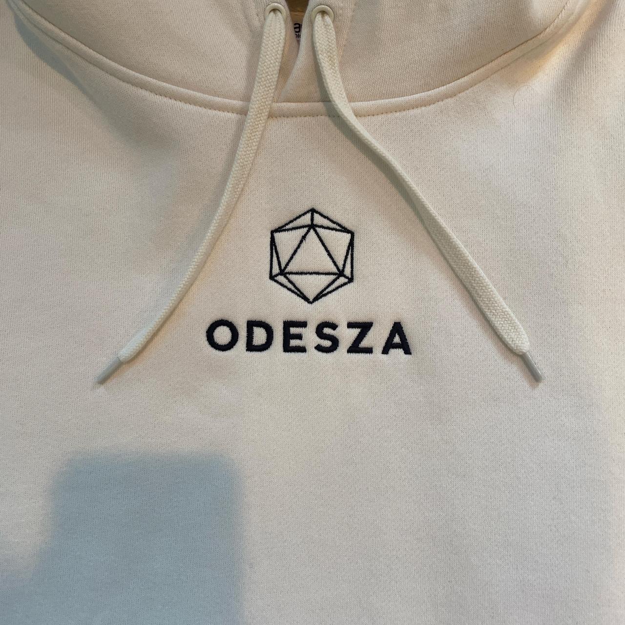 Official Odesza cream hoodie. Size L. Never worn.... - Depop