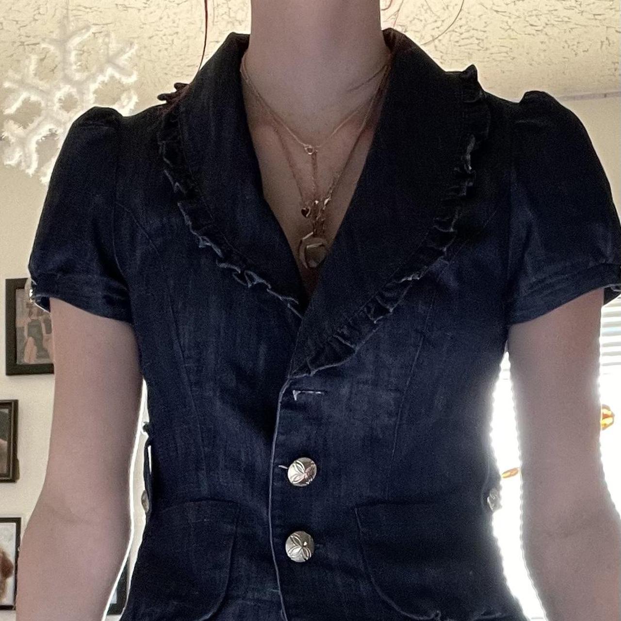 Lightly used coquette vest, one missing button - Depop