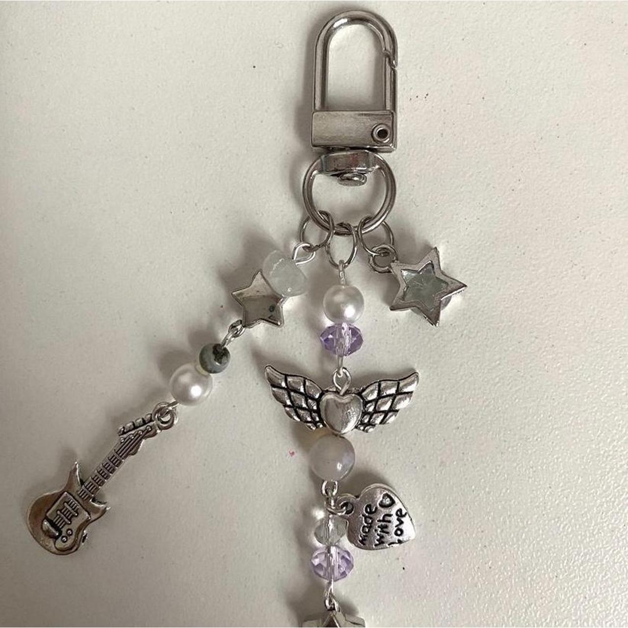 purple rockstar gf keychain ⚡️ ⋆ ˚｡⋆୨♡୧⋆ ˚｡⋆ ... - Depop