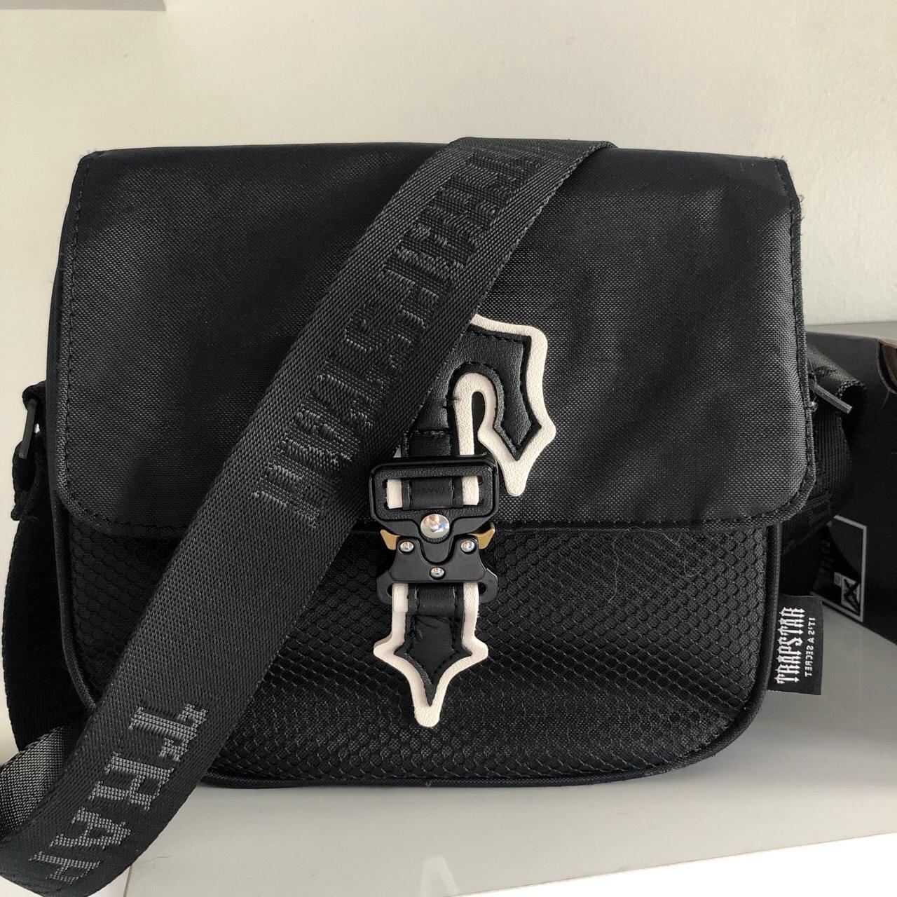 Black/white Trapstar 1.0 pouch Dm for more info... - Depop