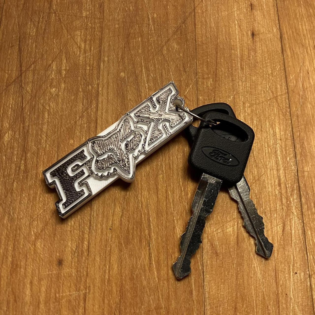 grunge fox racing keychain. super nice essential... - Depop