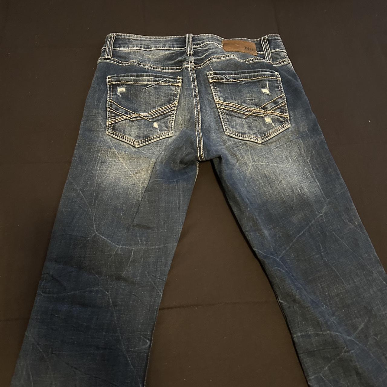 Buckle Distressed blue denim jeans with a ripped fit... | Depop