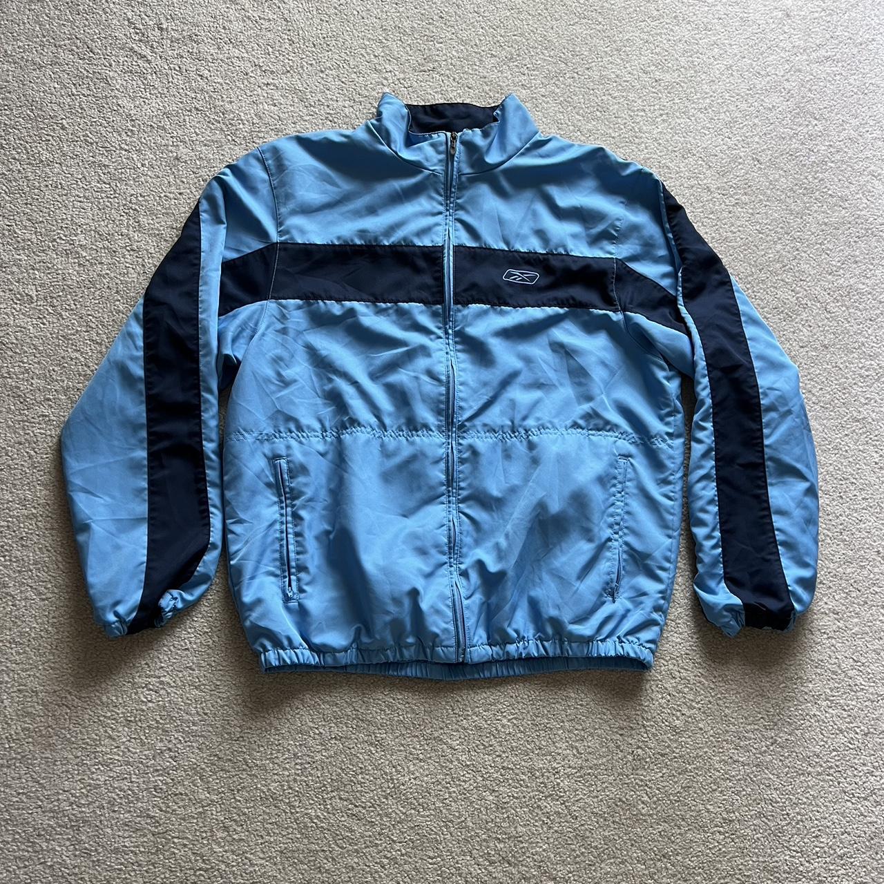 Reebok Men's Blue and Black Jacket | Depop