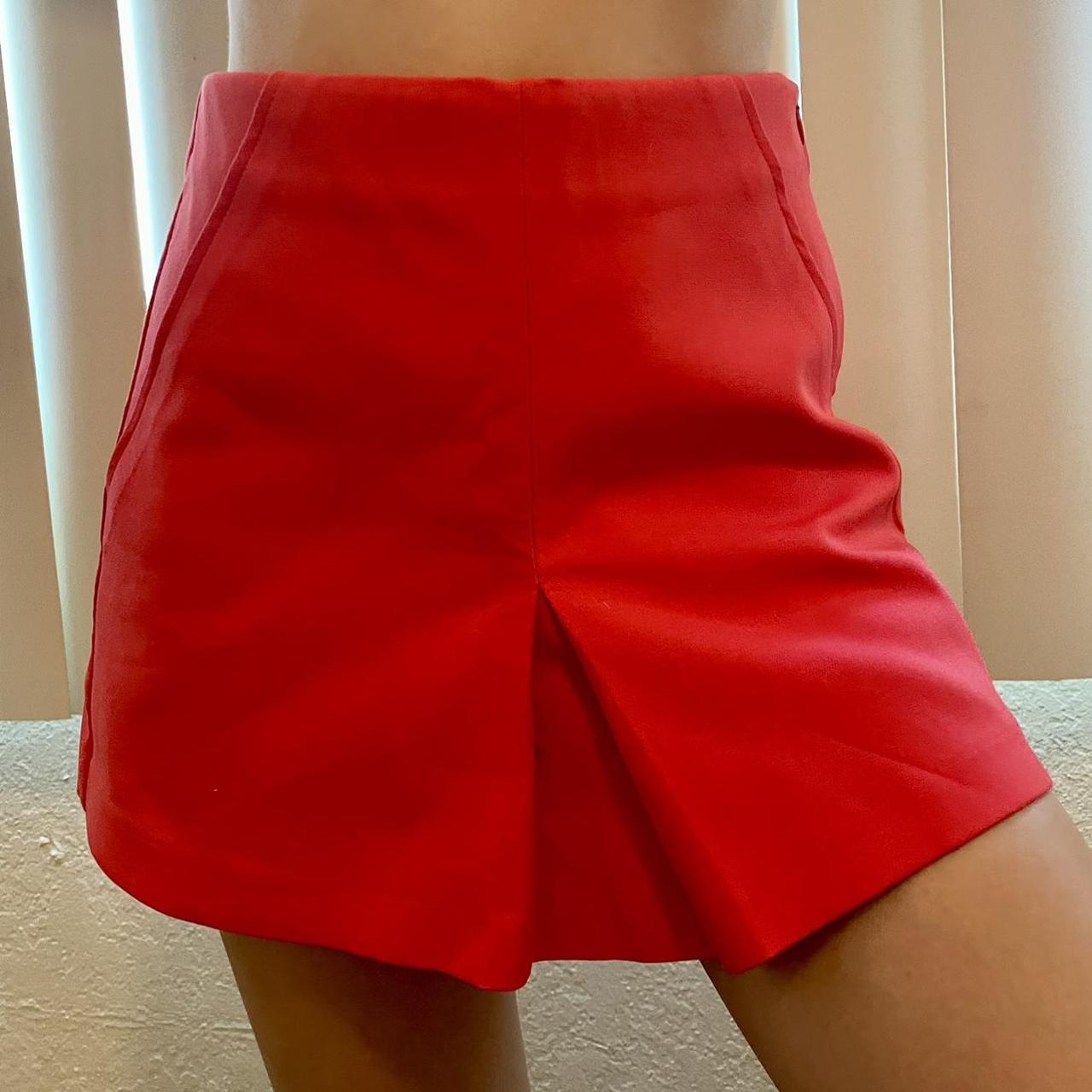 This Zara burnt orange/red skort has a beautiful fit... - Depop