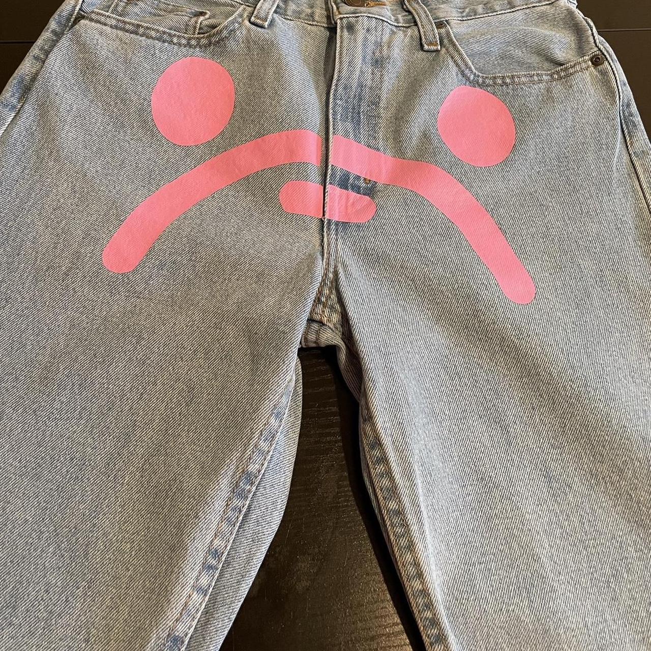 Sad boy jeans - pink print on light wash men jeans... - Depop