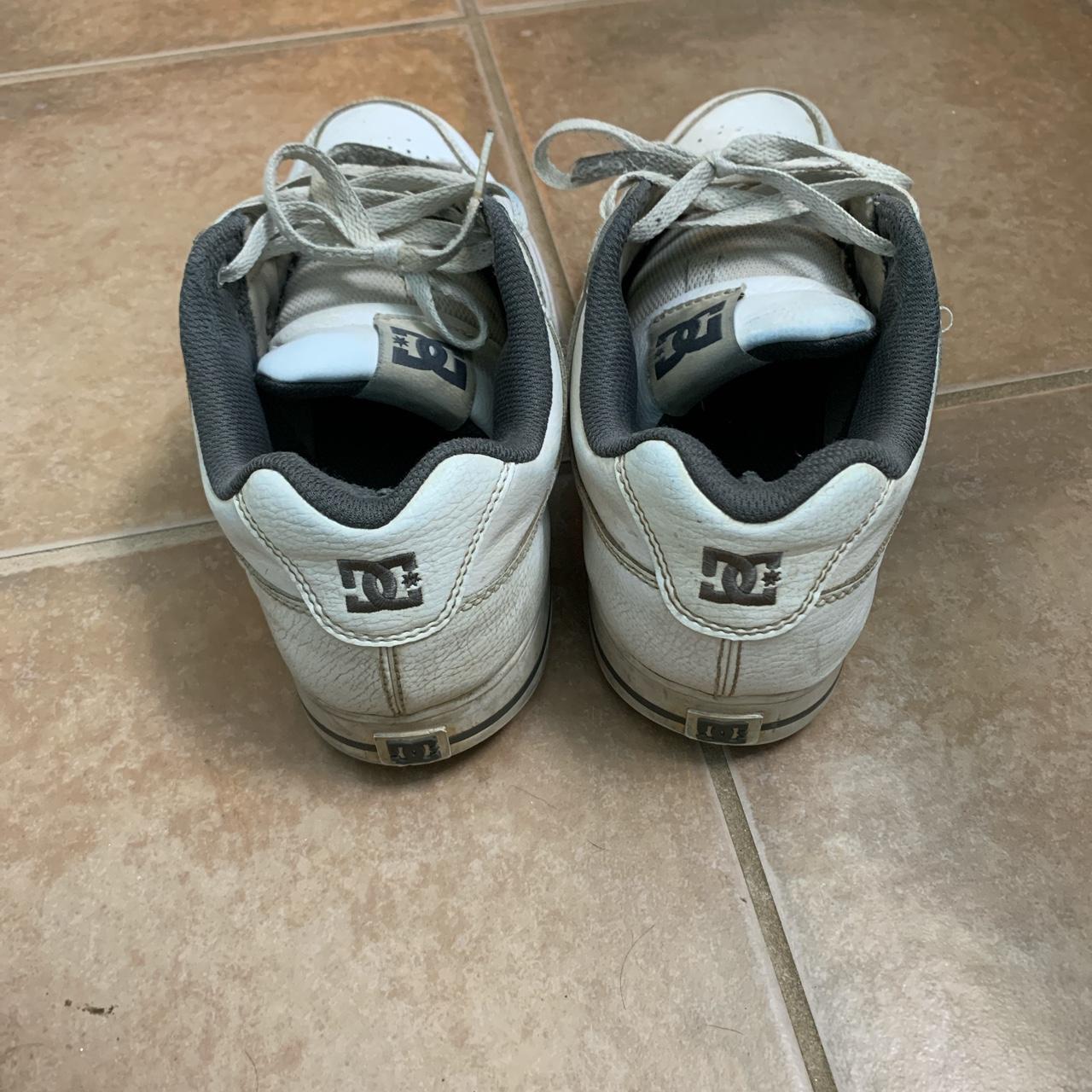 white dc shoes inside has some ware to it and so do... - Depop