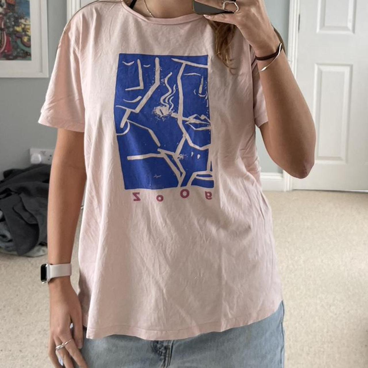 Pink graphic tee with blue drawing. Bought from... - Depop