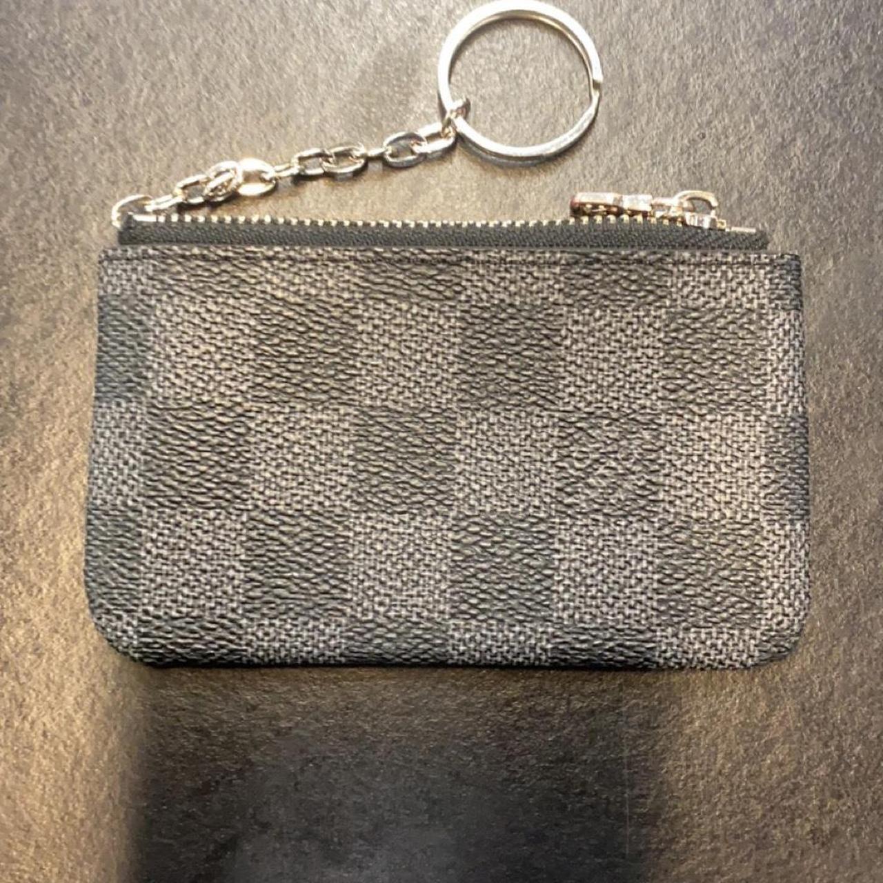 louis vuitton coin pouch small scratch on the back... - Depop