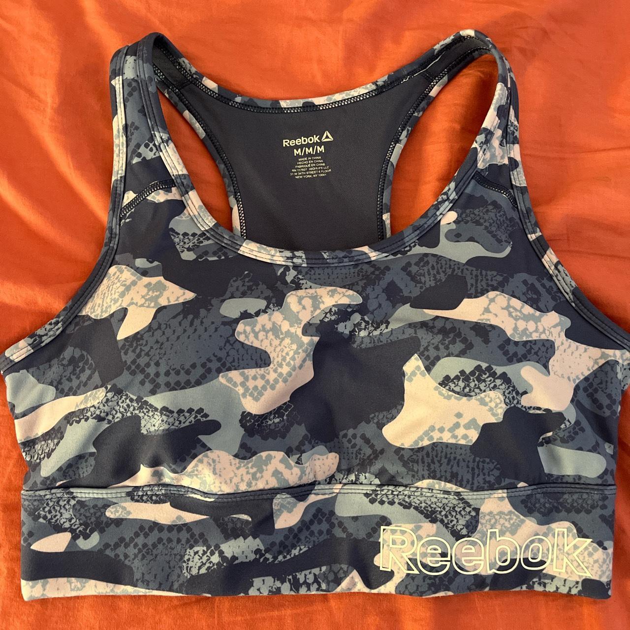 Reebok sports bra Has padding on the inside and... - Depop