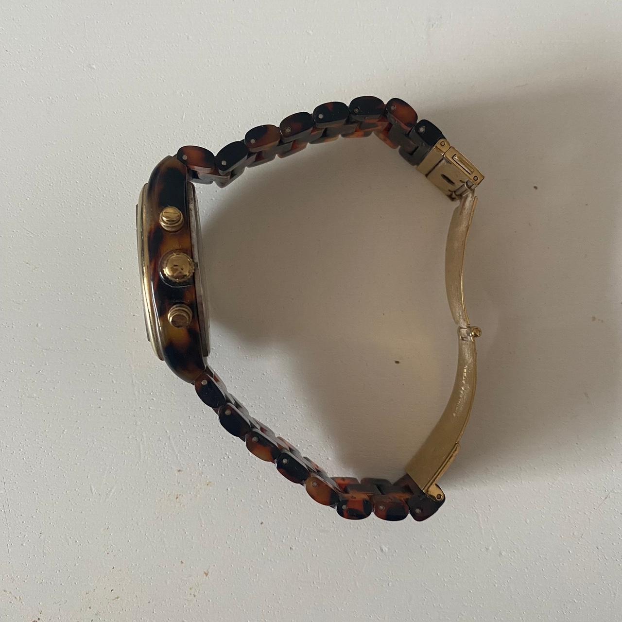 Michael Kors tortoise shell watch Needs a new... - Depop