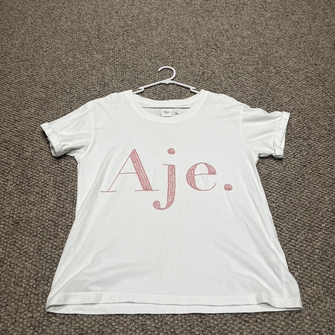 Aje T-Shirt from Banksia collection. Two beads loose... - Depop