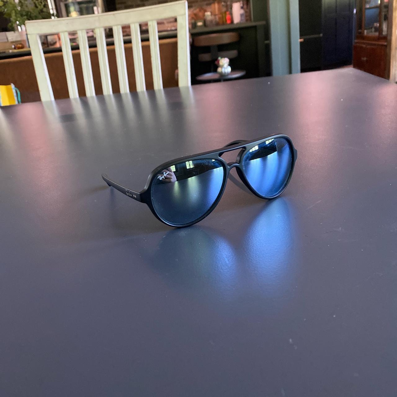 Used black ray-bans, blue reflective lenses, in... - Depop