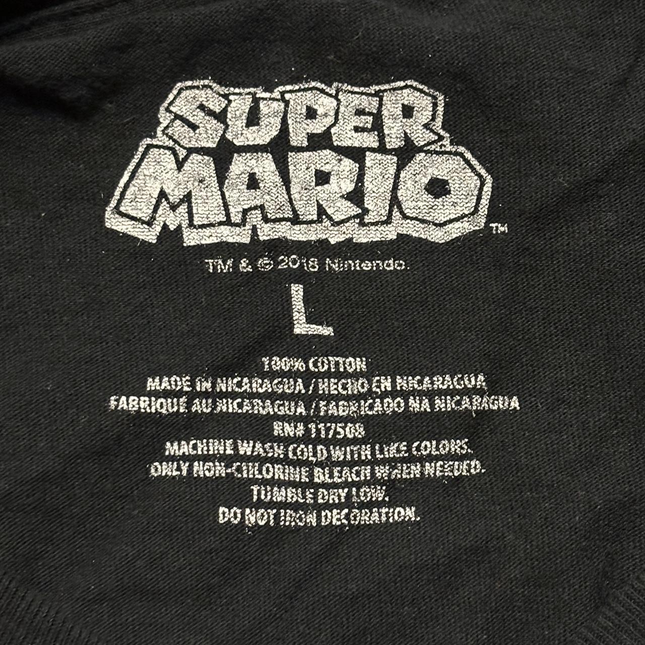 Black long sleeve Super Mario crop top from Forever... - Depop