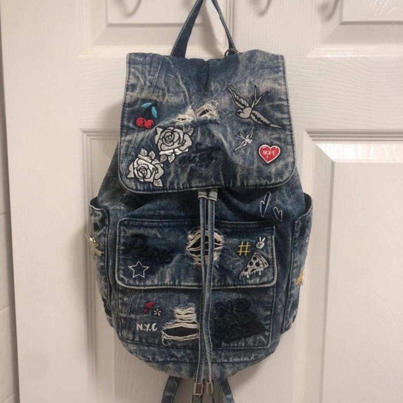 Medium sized girls intricate ripped denim backpack... - Depop
