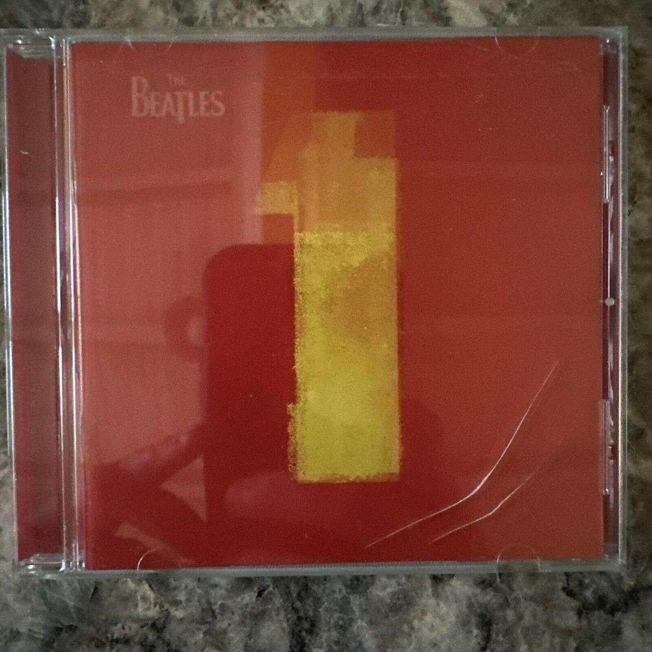 This CD by The Beatles is a must-have for any music... - Depop