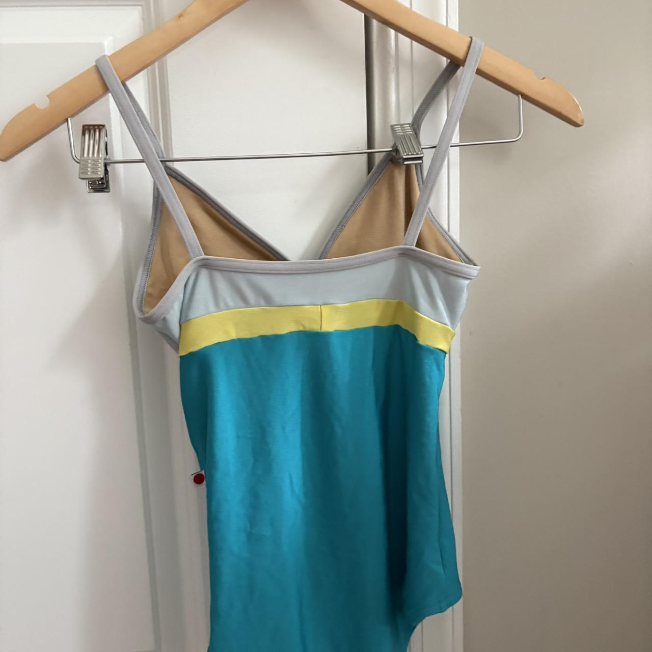 Turquoise, blue, and yellow, yumiko leotard | Depop