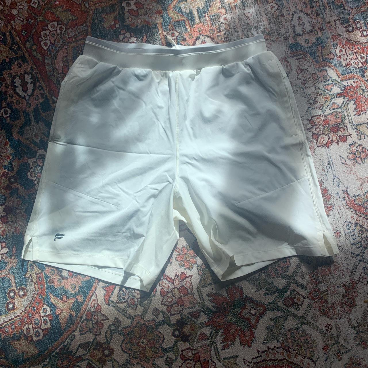 White Fabletics shorts with innerliner Measurements... - Depop
