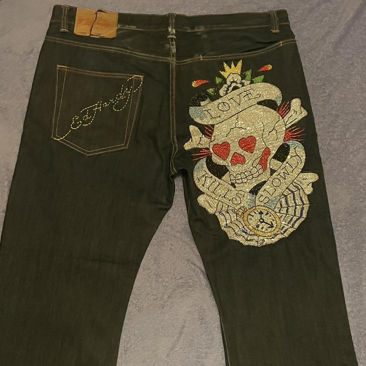 All over rhinestone Ed Hardy’s Size 42 Leg damage... - Depop