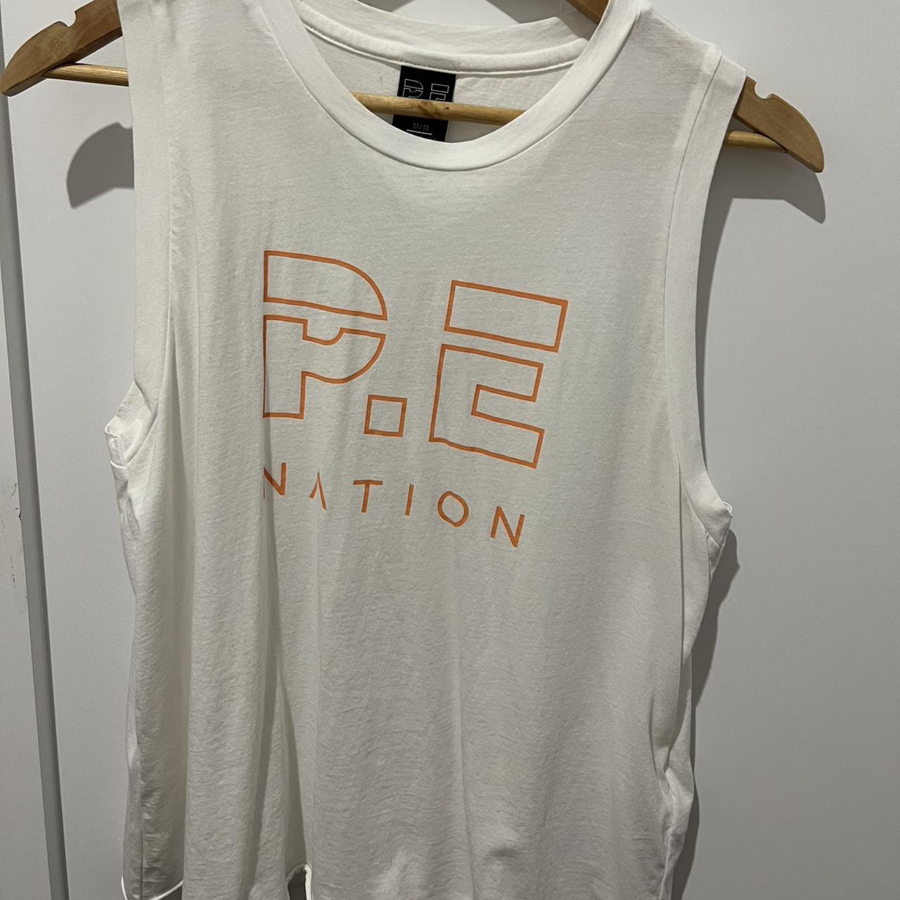 white pe nation tank, size medium, only worn once | Depop