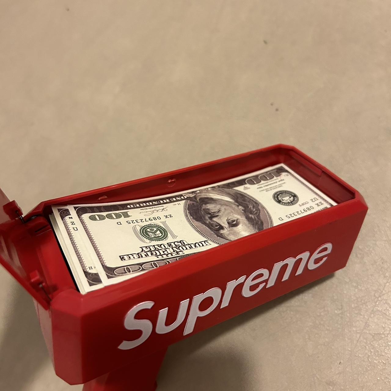 Old supreme money gun still works lost the old money... - Depop