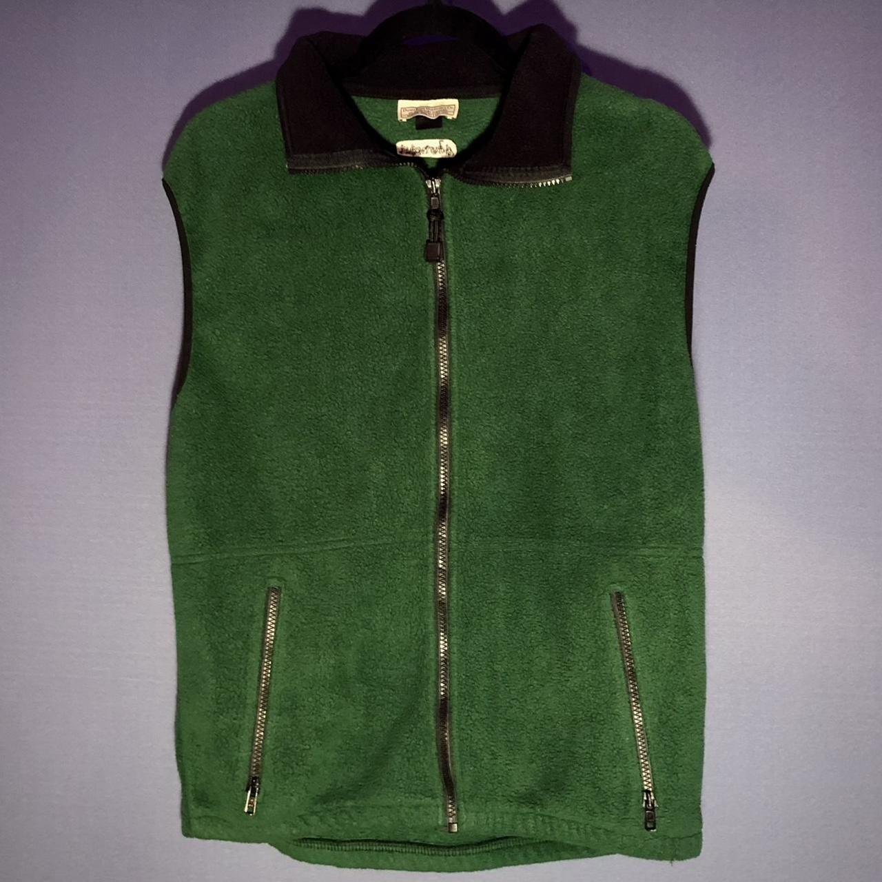 Green fuzzy vest witte zipper and zip up pockets and... - Depop