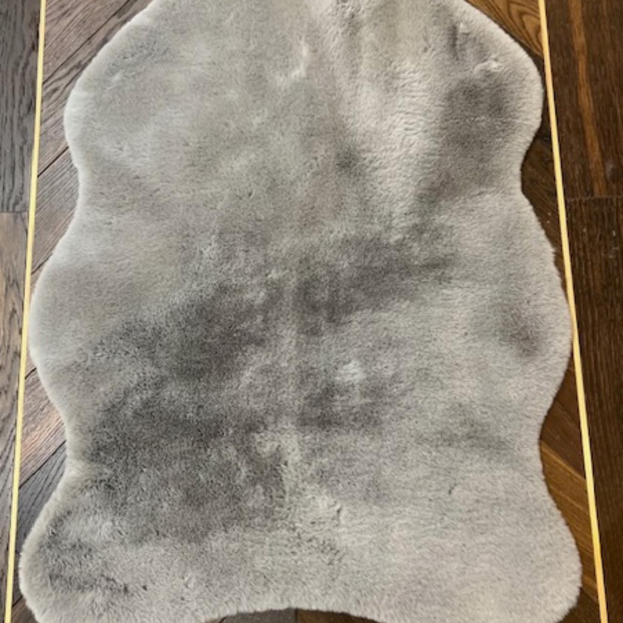 grey fluffy cloud-shaped rug - Depop
