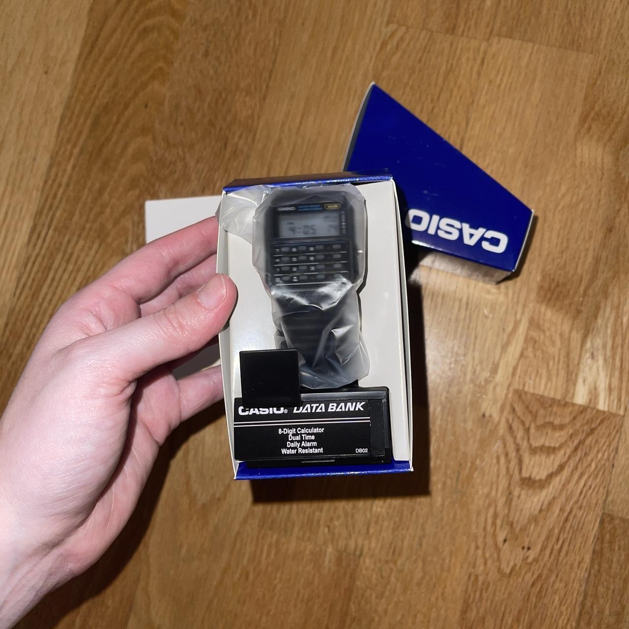 Casio Data Bank calculator watch with black band,... | Depop