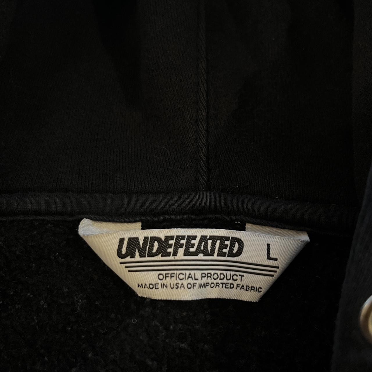 Undefeated Men's Black Hoodie | Depop