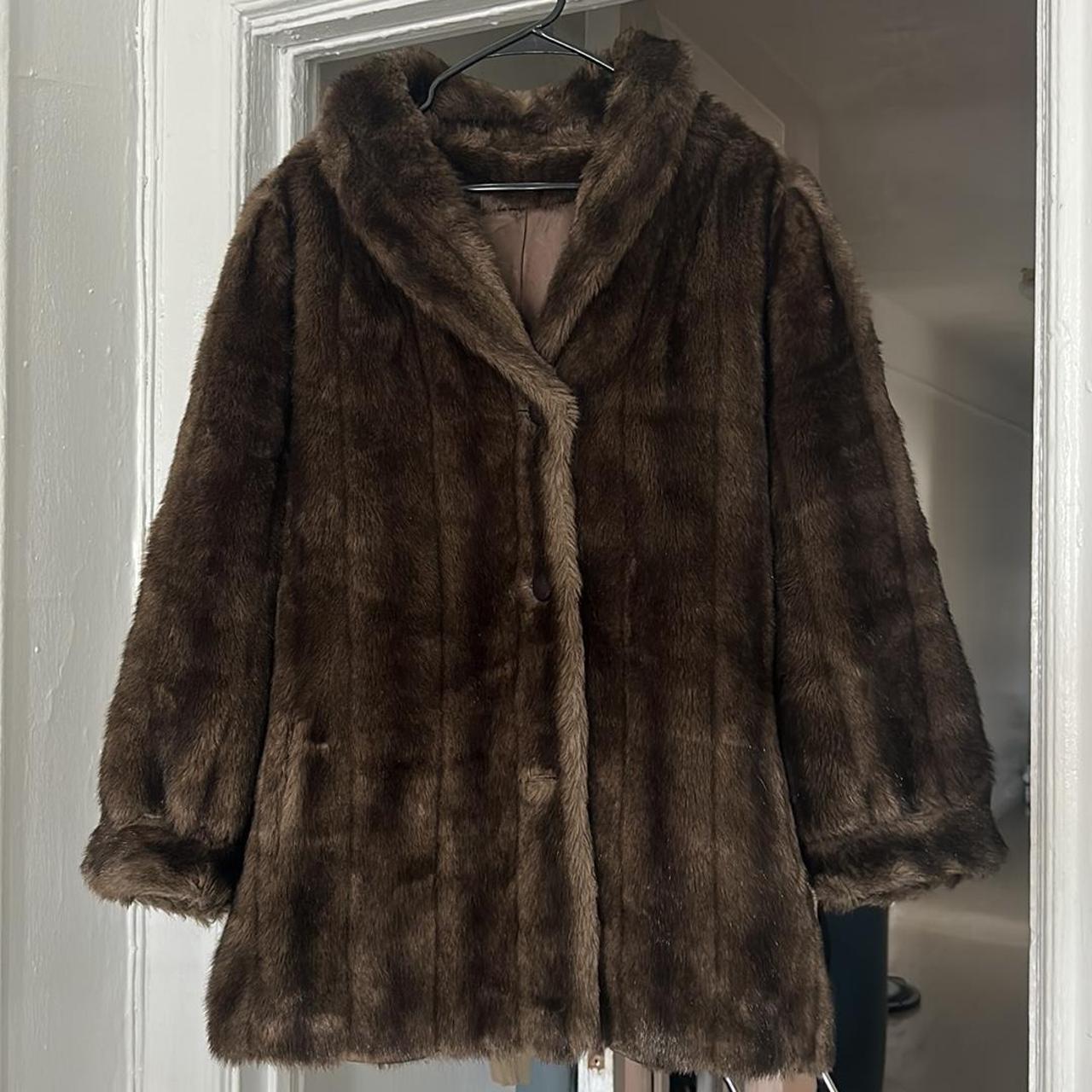 Brown faux fur vintage coat. Fits a size medium. One... - Depop