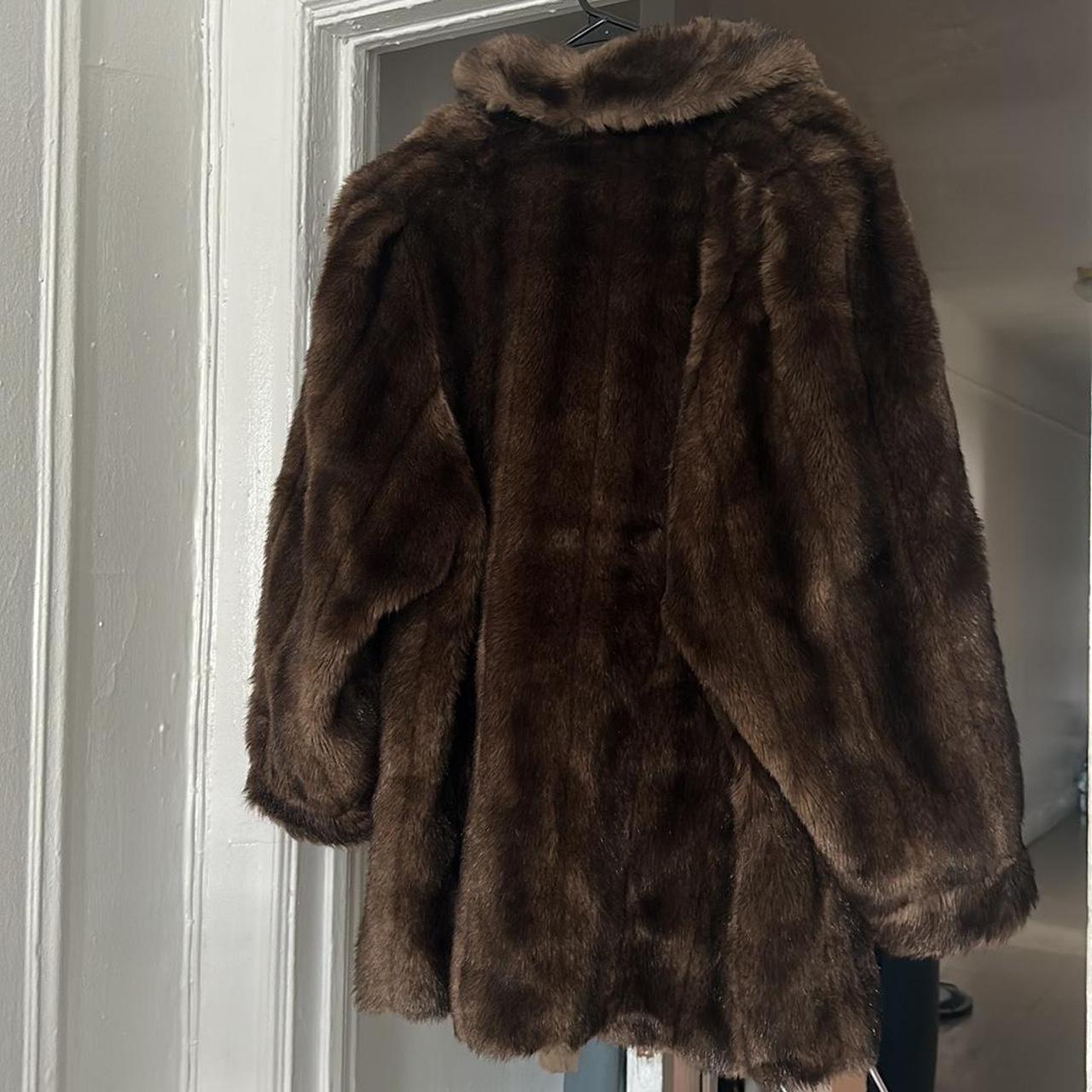 Brown faux fur vintage coat. Fits a size medium. One... - Depop