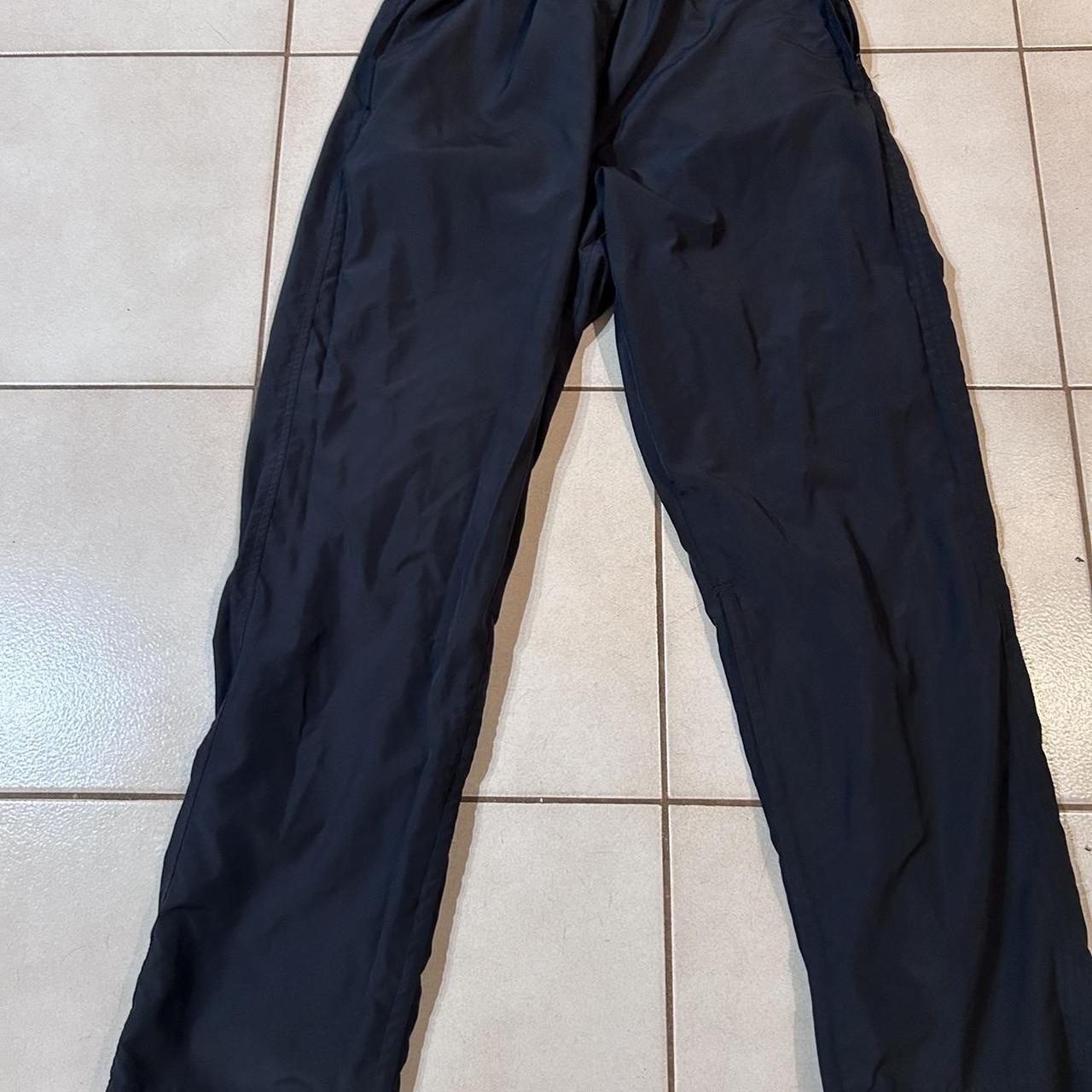 Black champion trackies with zip pockets barely worn - Depop