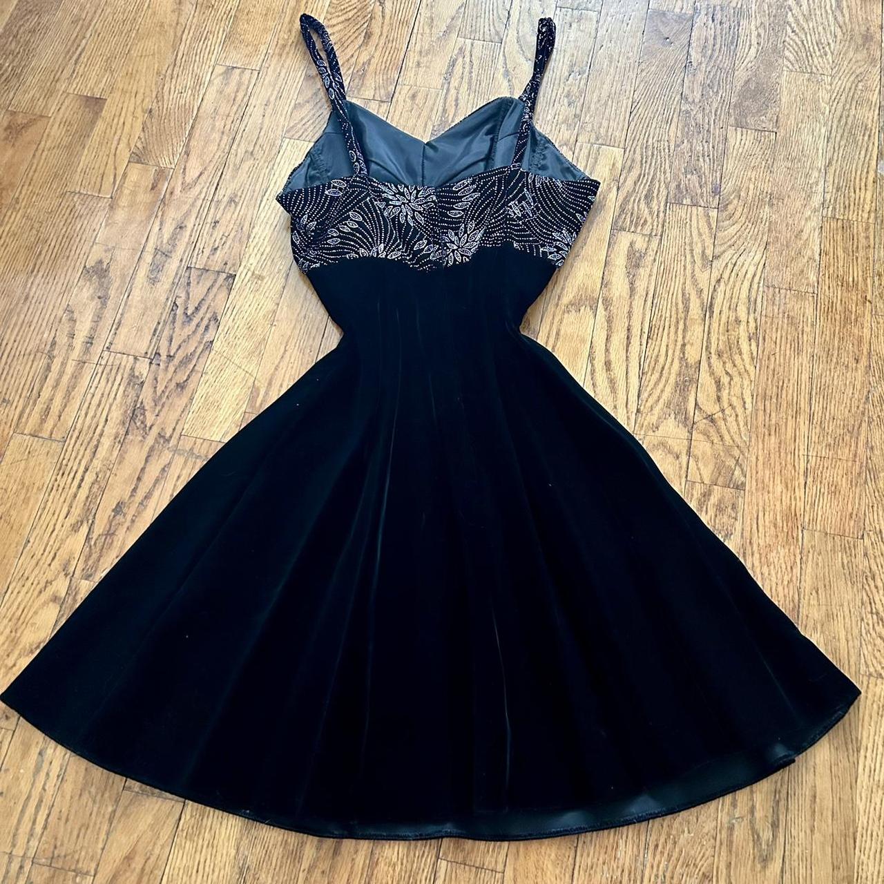 This is a vintage black velvet mini dress from Mike... - Depop